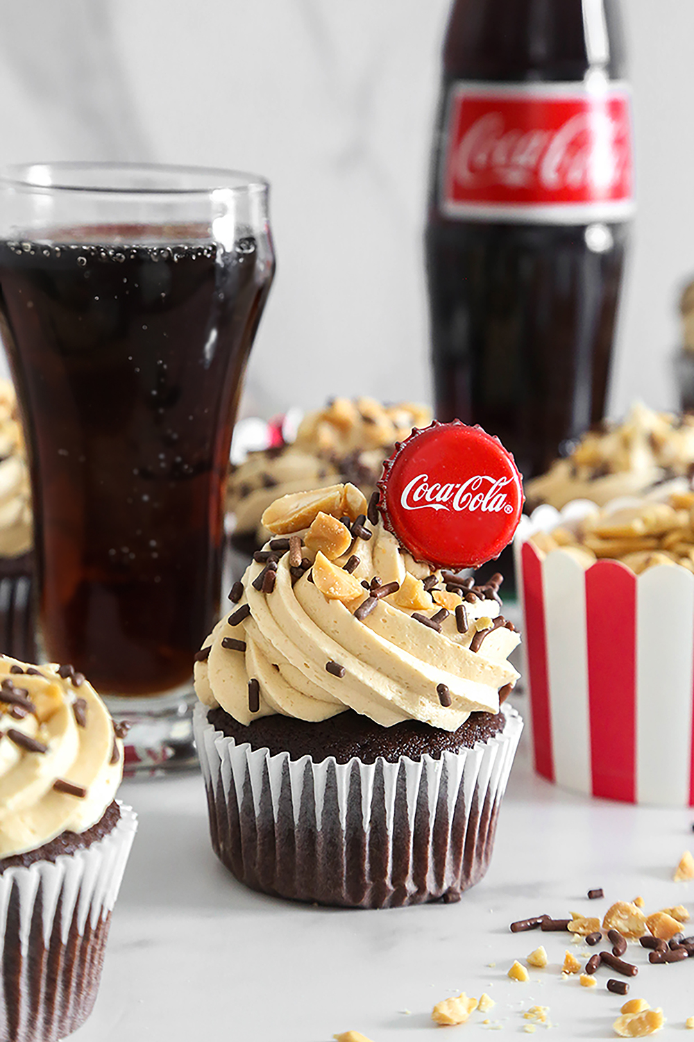 Coca-Cola Cupcakes with Salted Peanut Butter Frosting - Sprinkle Bakes